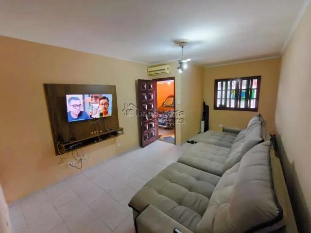 Casa / Sobrado para Venda em Praia Grande/SP Jardim Real 2 Quartos