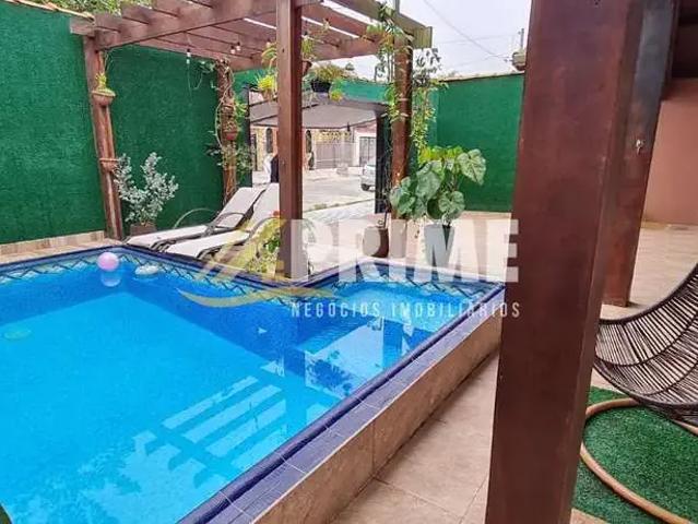 Casa / Sobrado para Venda em Praia Grande/SP Jardim Real 3 Quartos