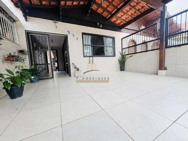 Casa / Sobrado para Venda em Praia Grande/SP Jardim Real 3 Quartos