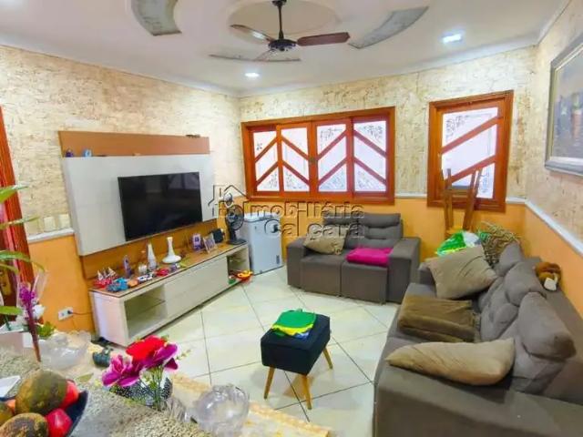 Casa / Sobrado para Venda em Praia Grande/SP Jardim Real 3 Quartos
