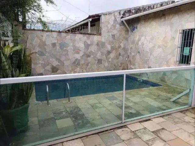 Casa / Sobrado para Venda em Praia Grande/SP Jardim Real 3 Quartos