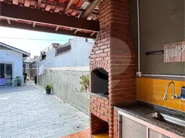 Casa / Sobrado para Venda em Praia Grande/SP Jardim Real 3 Quartos