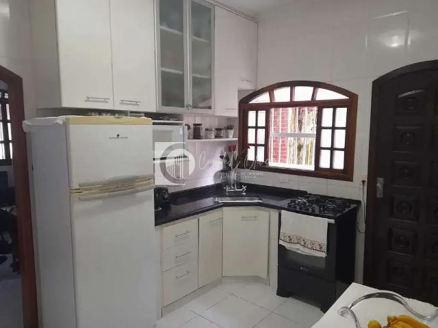 Casa / Sobrado para Venda em Praia Grande/SP Jardim Real 3 Quartos