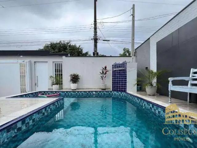 Casa / Sobrado para Venda em Praia Grande/SP Jardim Real 3 Quartos