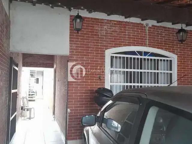 Casa / Sobrado para Venda em Praia Grande/SP Jardim Real 3 Quartos