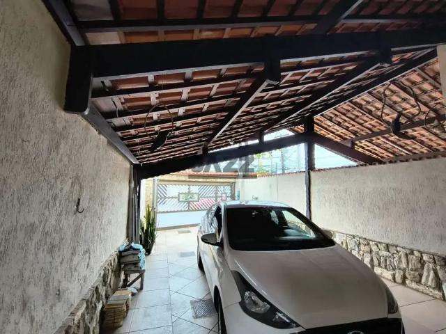 Casa / Sobrado para Venda em Praia Grande/SP Jardim Real 3 Quartos