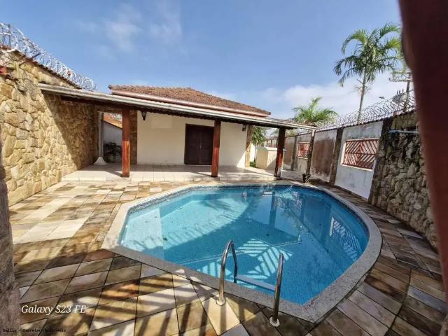 Casa / Sobrado para Venda em Praia Grande/SP Jardim Real 3 Quartos