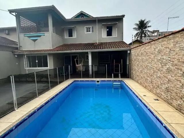 Casa / Sobrado para Venda em Praia Grande/SP Jardim Real 3 Quartos