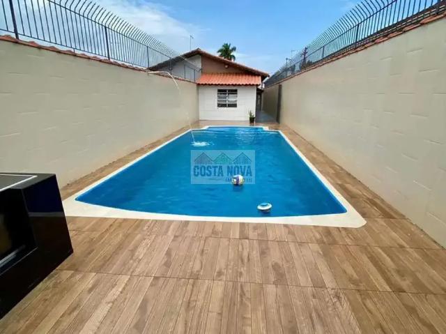 Casa / Sobrado para Venda em Praia Grande/SP Jardim Real 3 Quartos