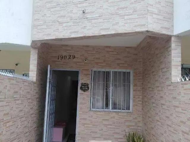 Casa / Sobrado para Venda em Praia Grande/SP Jardim Real 3 Quartos