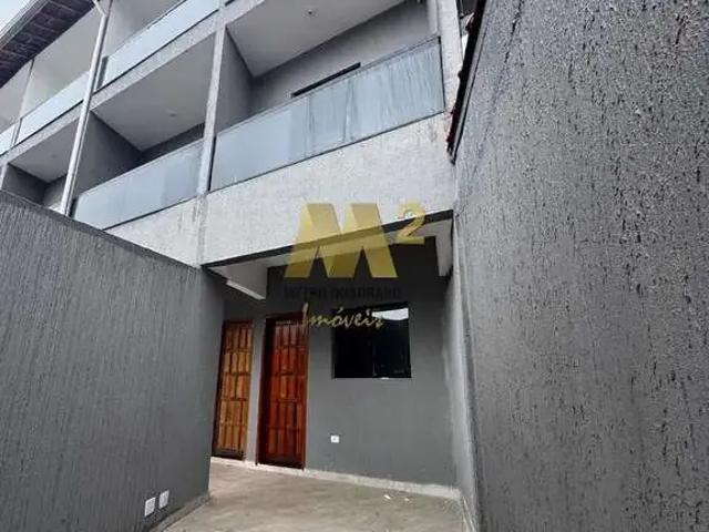 Casa / Sobrado para Venda em Praia Grande/SP Jardim Real 3 Quartos
