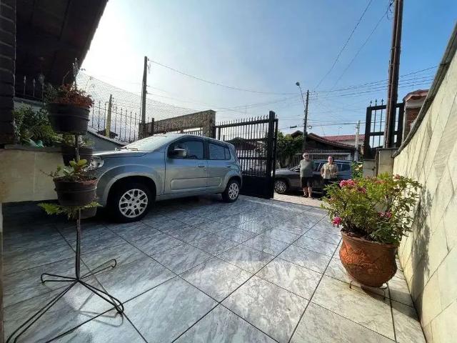 Casa / Sobrado para Venda em Praia Grande/SP Jardim Real 3 Quartos