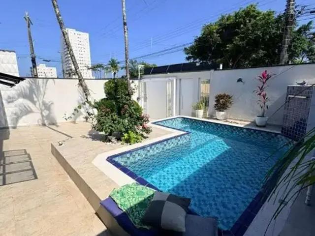 Casa / Sobrado para Venda em Praia Grande/SP Jardim Real 3 Quartos