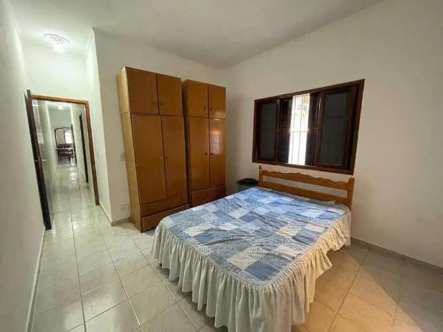 Casa / Sobrado para Venda em Praia Grande/SP Jardim Real 3 Quartos