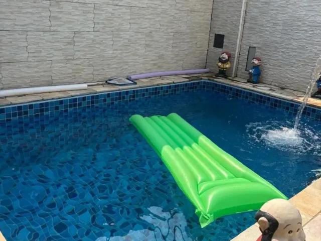 Casa / Sobrado para Venda em Praia Grande/SP Jardim Real 3 Quartos