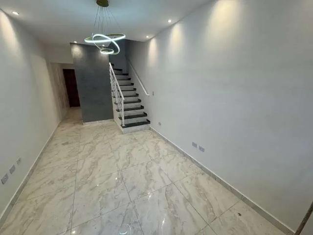 Casa / Sobrado para Venda em Praia Grande/SP Jardim Real 3 Quartos