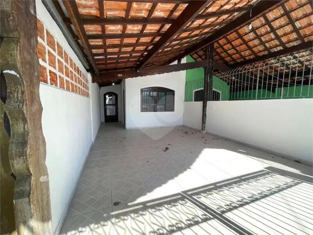 Casa / Sobrado para Venda em Praia Grande/SP Jardim Real 3 Quartos