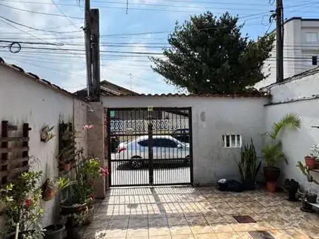 Casa / Sobrado para Venda em Praia Grande/SP Jardim Real 3 Quartos