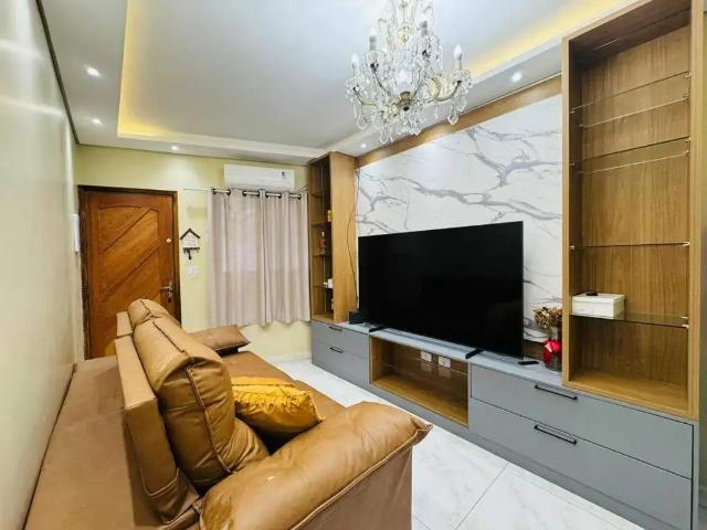 Casa / Sobrado para Venda em Praia Grande/SP Jardim Real 3 Quartos