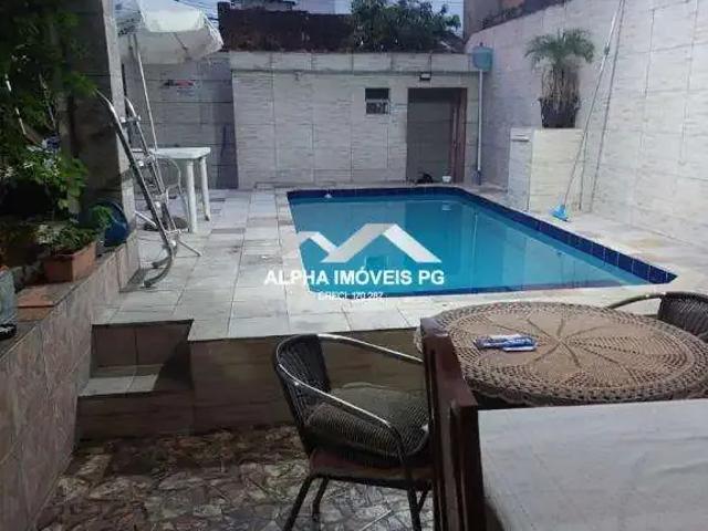 Casa / Sobrado para Venda em Praia Grande/SP Nova Mirim 4 Quartos