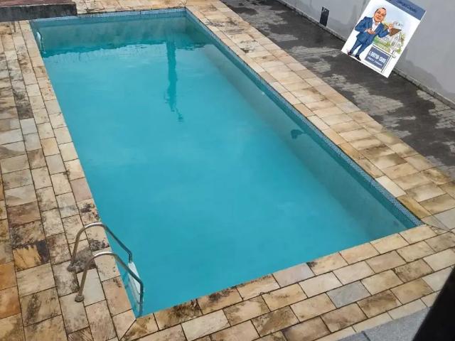 Casa / Sobrado para Venda em Praia Grande/SP Solemar 4 Quartos
