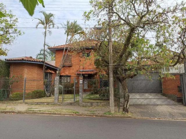 Casa / Sobrado para Venda em São Carlos/SP Jardim Macarengo 4 Quartos