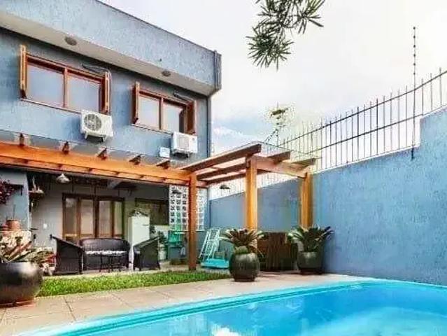 Casa / Sobrado para Venda em São Leopoldo/RS Jardim América 3 Quartos