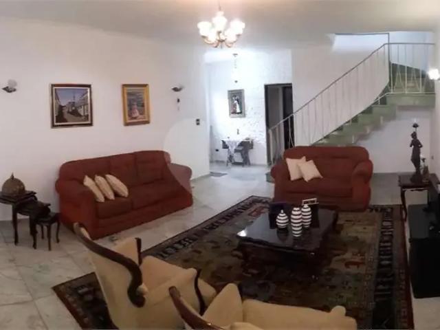 Casa / Sobrado para Venda em São Vicente/SP Centro 4 Quartos