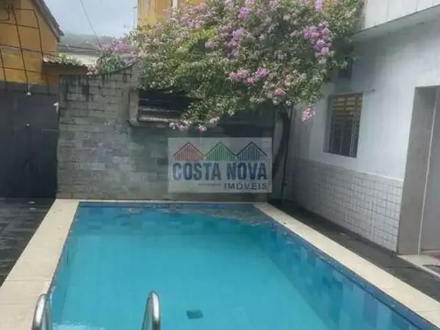 Casa / Sobrado para Venda em São Vicente/SP Jardim Guassu 4 Quartos