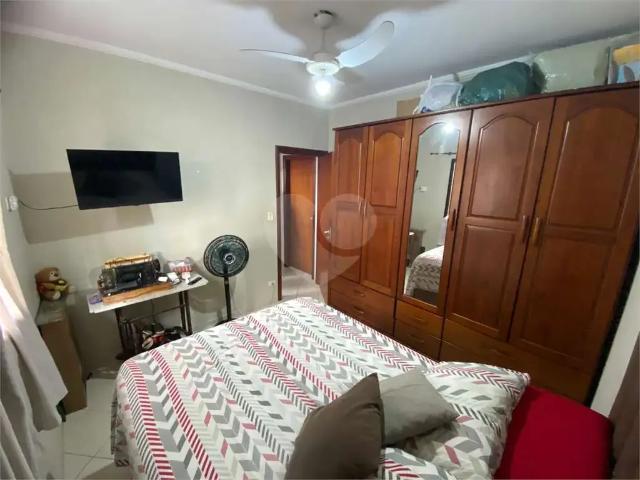 Casa / Sobrado para Venda em São Vicente/SP Vila Valença 3 Quartos