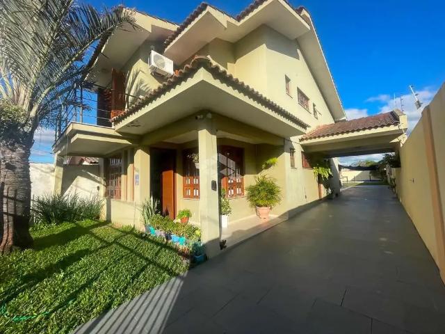 Casa / Sobrado para Venda em Santa Maria/RS Juscelino Kubitschek 4 Quartos