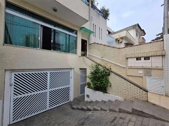 Casa / Sobrado para Venda em Santos/SP Boqueirão 5 Quartos