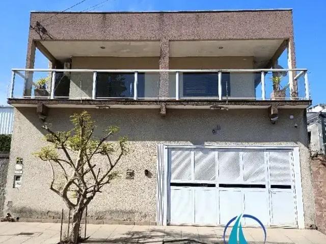 Casa / Sobrado para Locação em Caraguatatuba/SP Jaraguá 4 Quartos