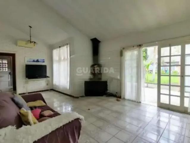 Casa / Sobrado para Locação em Porto Alegre/RS Guarujá 4 Quartos