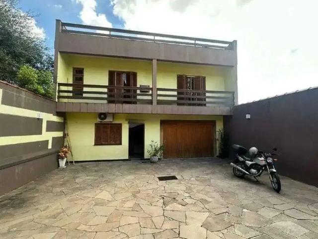 Casa / Sobrado para Locação em Porto Alegre/RS Jardim Floresta 4 Quartos