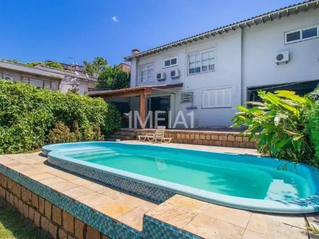Casa / Sobrado para Locação em Porto Alegre/RS Três Figueiras 4 Quartos