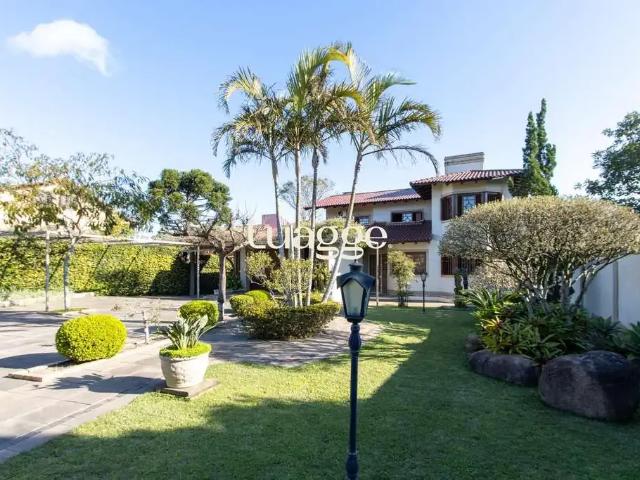 Casa / Sobrado para Locação em Porto Alegre/RS Vila Nova 4 Quartos