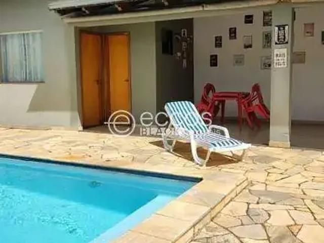 Casa / Sobrado para Locação em Uberlândia/MG Conjunto Segismundo Pereira 3 Quartos