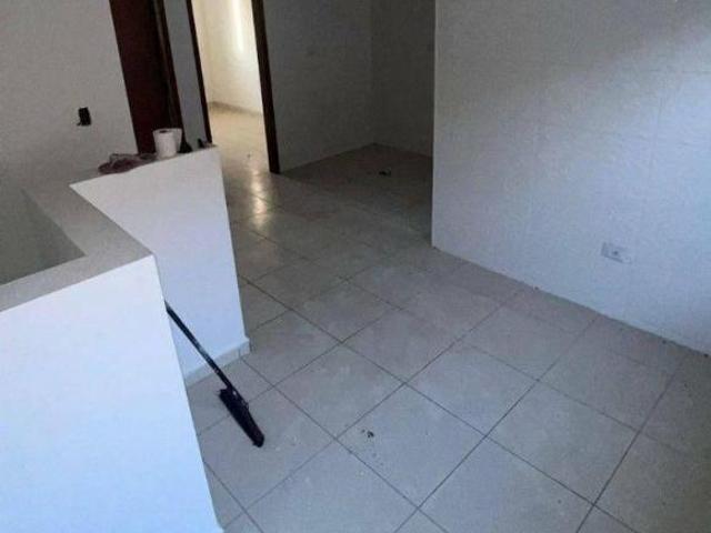 Casa sobreposta com 2 quartos no Jd. Melvi em Praia Grande/SP