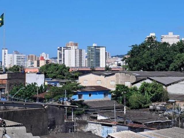 Casa sobreposta alta à venda no Gloria, em Praia Grande SP