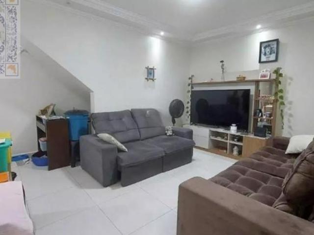 Casa sobreposta baixa para venda com 2 suítes e 2 vagas na Aparecida em Santos / SP
