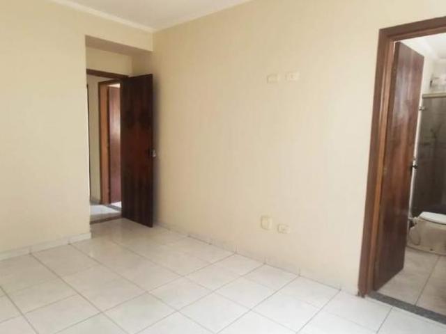 Casa sobreposta de 3 dormitórios na Ponta da Praia com quintal