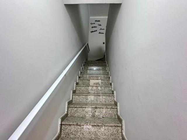 Casa SOBREPOSTA de condomínio à venda, 58 m² por R$ 353.000 Tude Bastos Praia Grande/SP