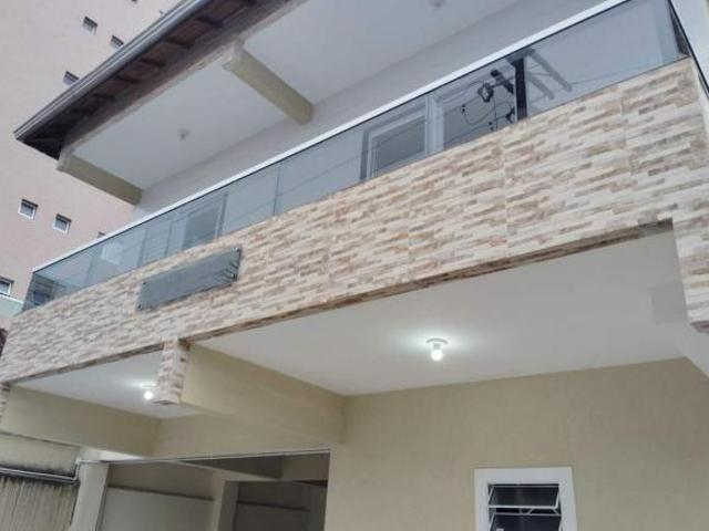 Casa sobreposta de condomínio à venda, 64 m² por R$ 365.000 Ocian Praia Grande/SP