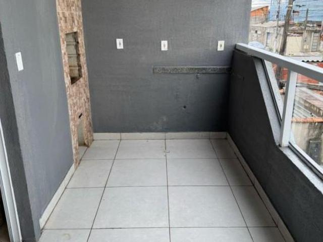 Casa Sobreposta para Venda em Praia Grande, Maracanã, 2 dormitórios, 1 suíte, 1 banheiro, 2 vagas
