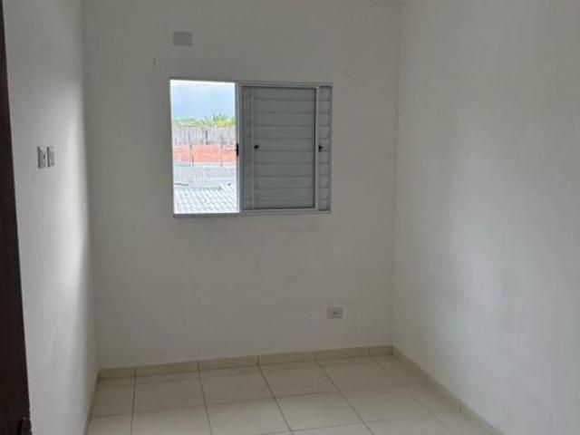 Casa Sobreposta para Venda em Praia Grande, Melvi, 2 dormitórios, 1 banheiro, 1 vaga