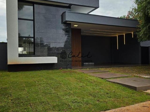 Casa térrea no Alphaville I com 4 suítes e pé direito alto, 252,48 m² de construção