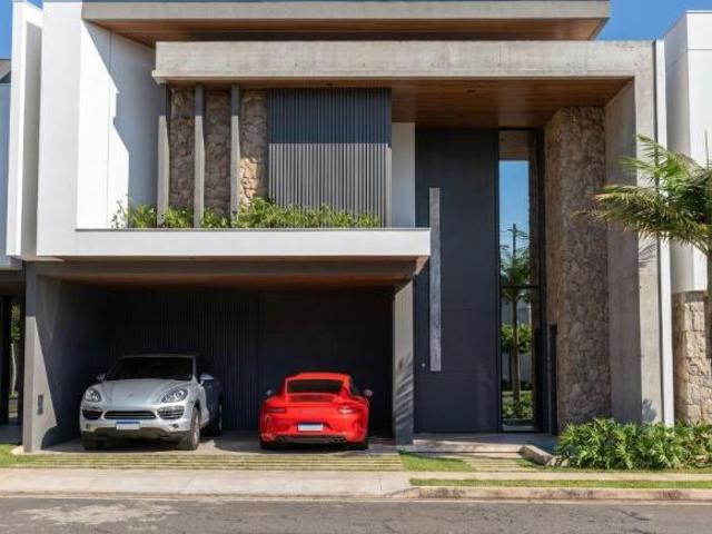 CASA TERRA EM CONSTRUÇÃO 4 SUITES EM CONDOMINIO ENTREGA PRONTA