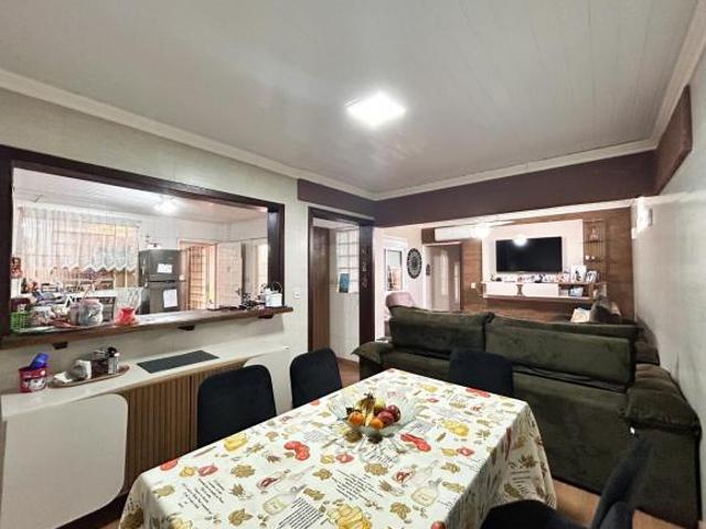 CASA TÉRREA 4 DORMITÓRIOS BAIRRO HARMONIA CANOAS / RS