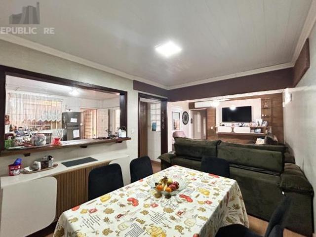 CASA TÉRREA 4 DORMITÓRIOS BAIRRO HARMONIA CANOAS / RS